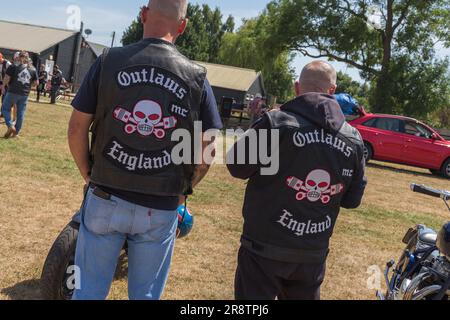 Members of the Outlaws Motorcycle Club wearing their patches at a biker ...