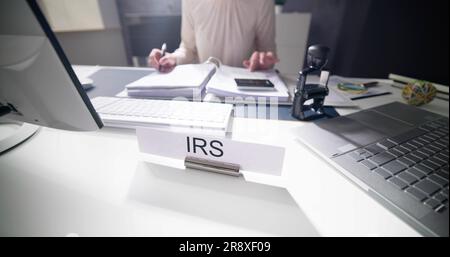 IRS Tax Audit Name Plate At Desk Stock Photo - Alamy