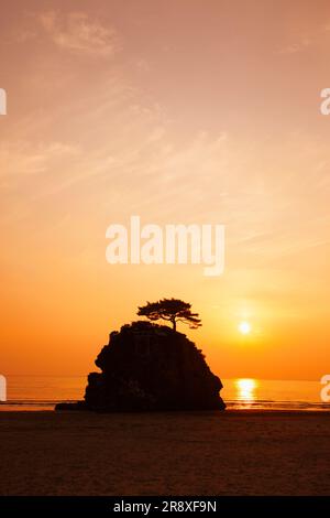 Sunset of Inasa beach and Bentenjima Stock Photo - Alamy