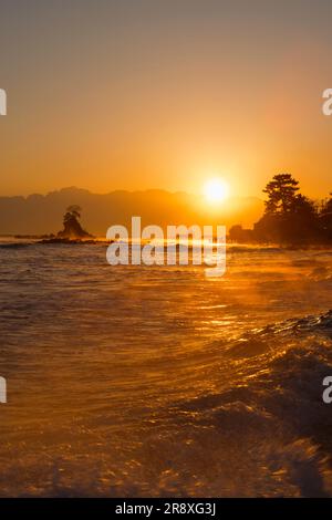 Amaharashi coast and the morning sun Stock Photo - Alamy