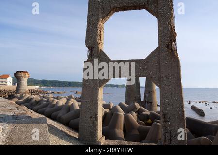 Sado gold mine Oma Port Truss bridge and crane pedestal Stock Photo - Alamy