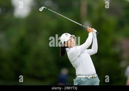 Ruoning Yin, of China, tees off on the third hole during the final ...