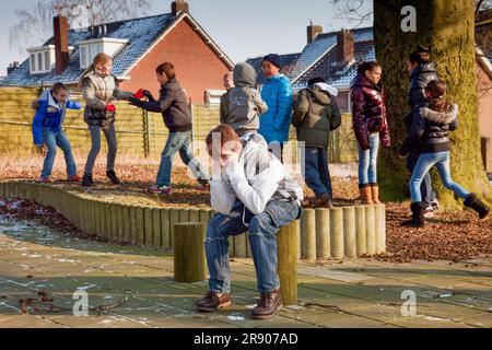 Netherlands, a child is left out and feels bullied in the playground of ...