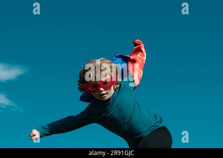 Excited child boy dressed like superhero. Super hero concept Stock ...