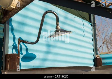 An outdoor shower in an Outback campsite near Kakadu National Park in ...