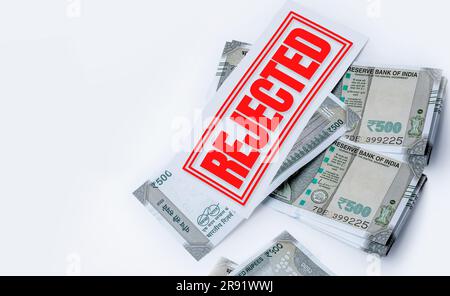 Loan Rejected Concept - Indian currency notes bills on white background ...