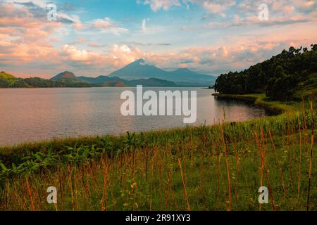 Sunset at Lake Mutanda with Mount Muhabura at the background, Kisoro ...