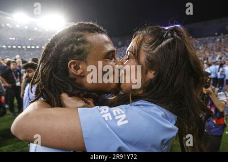 ISTANBUL - (LR) Nathan Ake of Manchester City FC, Kaylee Ramman during ...