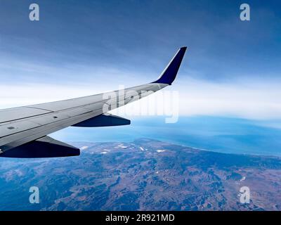 Airplane flying over the Sea of Cortez and the Pacific Ocean ...