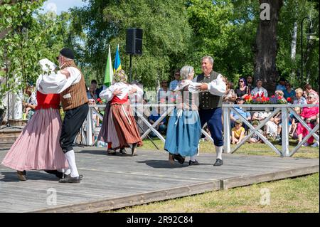 Traditional Swedish midsummer celebration with Folkdance and dancing ...