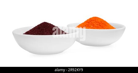 Bowls with food coloring on white background Stock Photo - Alamy