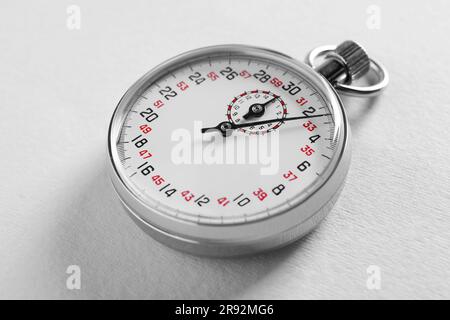 Vintage timer on light grey background, top view with space for text ...