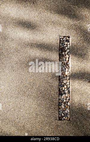 exposed aggregate finish texture background with sunlight shade Stock ...