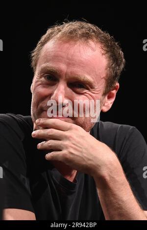 Cologne, Germany. 23rd June, 2023. Canadian actor Elliot Page speaks at ...
