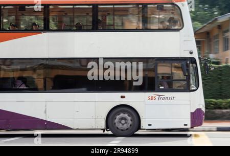 Close up of SBS Transit public bus driving on Singapore Road with ...