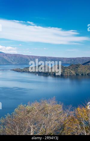 In Lake Towada, Nakayama Peninsula surrounded by autumn trees Stock ...