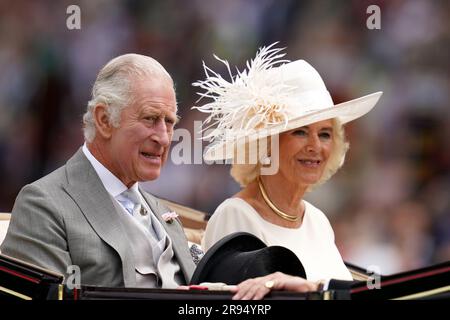 The carriage carrying King Charles III, Queen Camilla, The Earl of ...