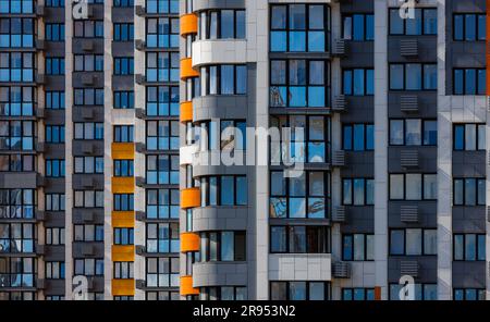 full-frame view of freshly built high rise apartment building in white ...