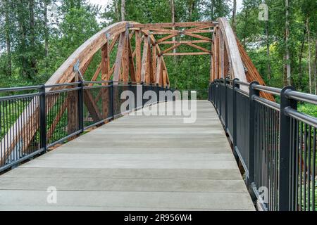 A walkway onto a pedestrian bridge in Bothell, Washington Stock Photo ...