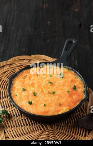 Homemade Steamed Corn on the Cob with Butter on a Plate, side view ...