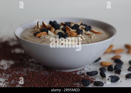 Ragi porridge. A porridge made of finger millet flour, sweetened with ...