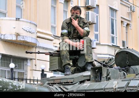 Fighters of the private military group "Wagner" stand near the ...