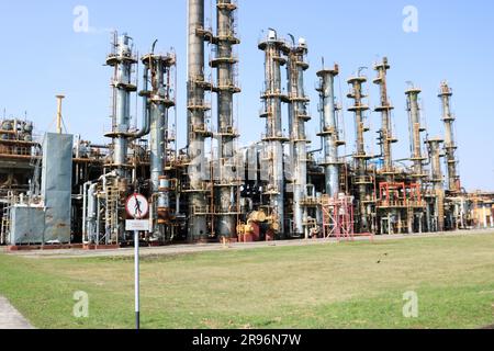 Onshore oil and gas processing plant showing pipework with oil ...