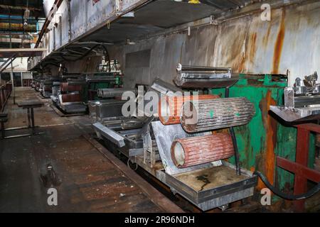 Large metal rollers rolls with teeth of the gears of the production ...