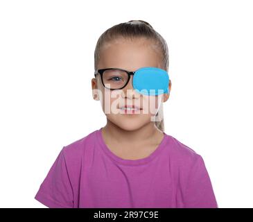Happy girl with nozzle on glasses for treatment of strabismus against ...