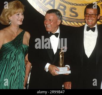 Barbara Sinatra Frank Sinatra Roger Moore at the Friars Club 'Man of ...