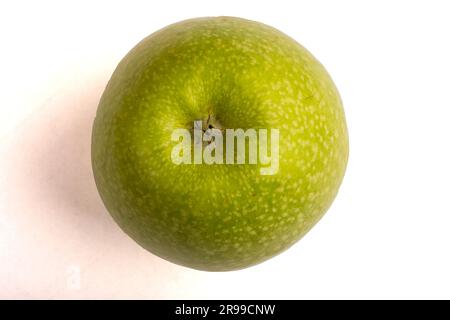 green apple with fading from above, isolated on white background Stock ...