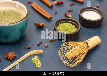 Bowls with powdered matcha green tea on wooden board Stock Photo - Alamy