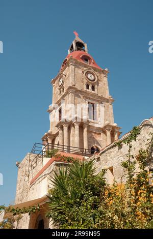 the historic roloi medieval clock tower in rhodes town against a blue ...