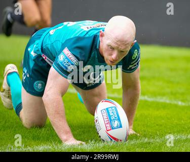Wigan Warriors' Liam Farrell (second right, facing) celebrates scoring ...