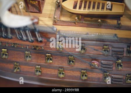 Antique gun ship with boats and sails, mock-up. Old objects of the 18th ...