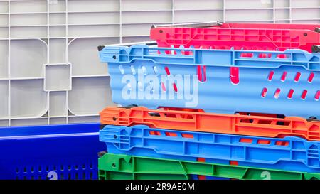 Colorful plastic boxes, logistic concept Stock Photo - Alamy