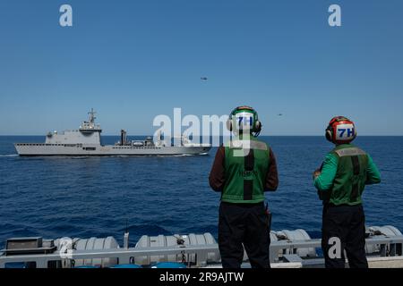 Aviation Electrician's Mate 1st Class Jesse Sabol (left), from ...