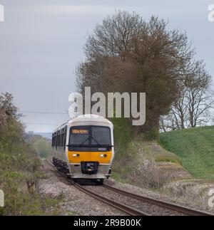 Chiltern Railways class 165 Turbo train reflected in the flooded fields ...