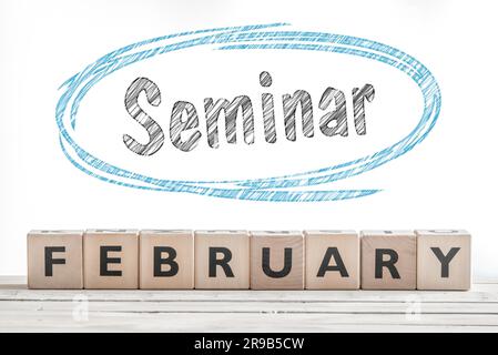 February seminar sign made of wood on a stage Stock Photo - Alamy