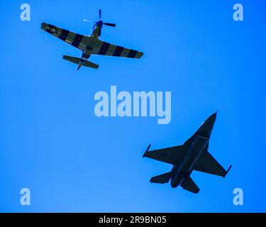 The Mustang and Fighting Falcon flying overhead Stock Photo - Alamy
