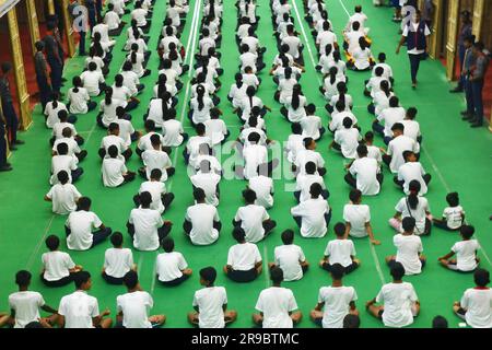 Government officials and people perform yoga during an International ...