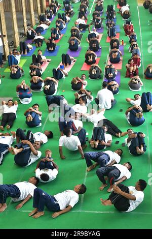 Government officials and people perform yoga during an International ...