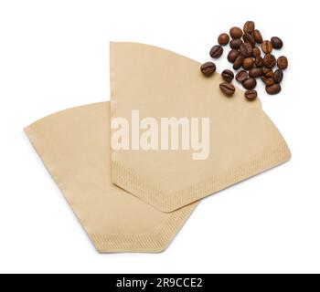 Paper coffee filters and beans isolated on white Stock Photo - Alamy