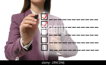 Virtual to do list, writing and woman planning daily chores, tick box ...