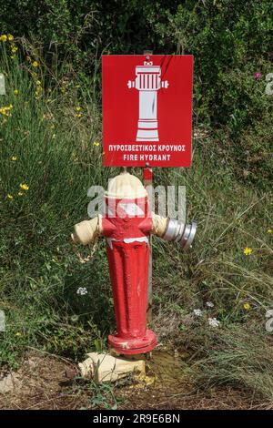 Red painted fire hydrant, Kefalonia,Greece Stock Photo - Alamy