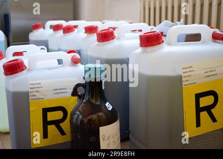 Toxic waste in jerry cans in the chemistry laboratory Stock Photo - Alamy