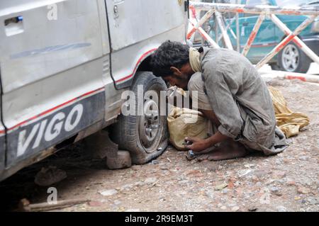 June 26, 2023, Islamabad, Pakistan: A Pakistani drug addict smokes ...