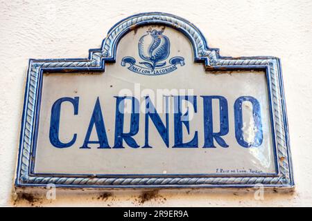 Glazed ceramic street sign in English Hebrew and Arabic of the Churches ...