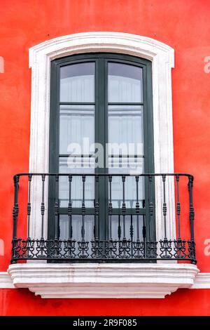 Typical andalusian house window with wrought iron grill in Rota city ...
