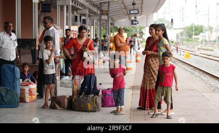 Beawar, India, June 25, 2023: Rajasthani woman with her children waits ...